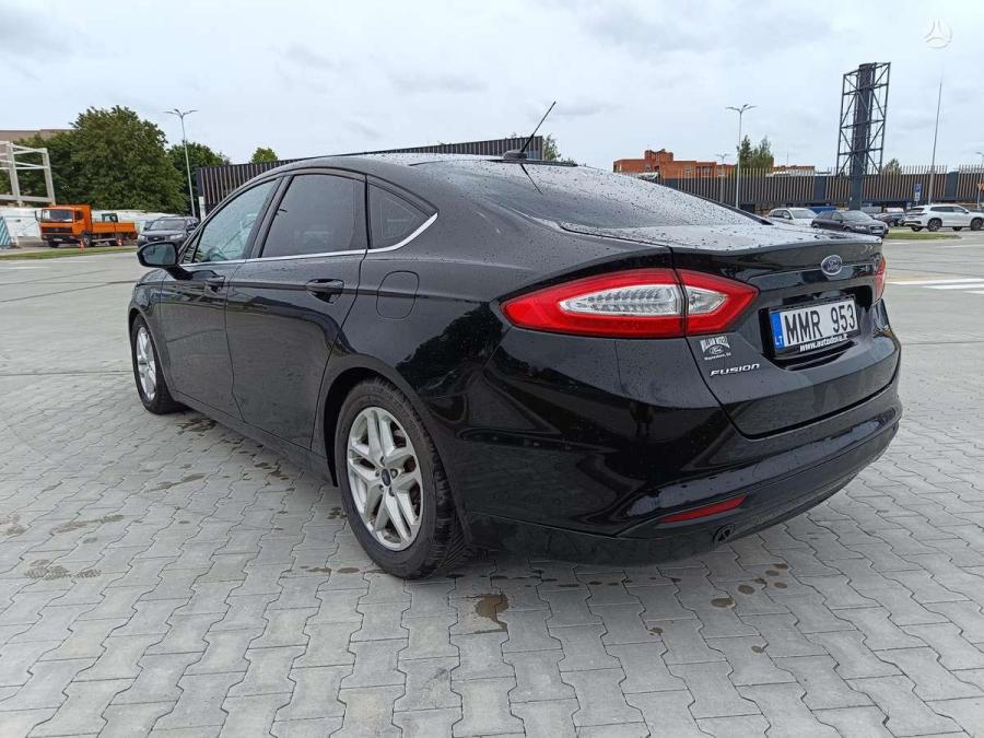 Black Ford Mondeo 2016 in Kaunas, with an engine capacity of 2.50 L and mileage of 236 thousand km for 5000 €, photo 5 on AUTOMOTO.COM.LV