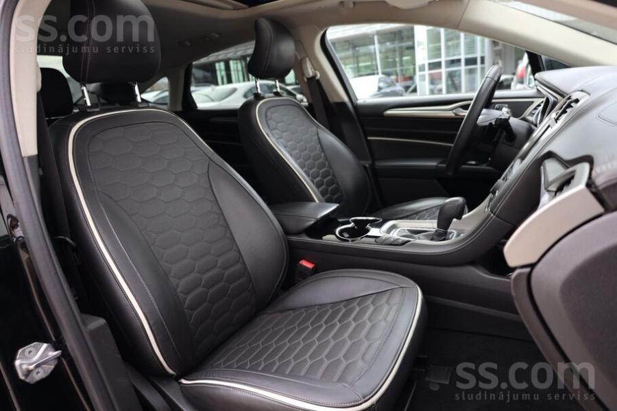 Black Ford Mondeo 2017 in Riga, with an engine capacity of 2.00 L and mileage of 0 thousand km for 7995 €, photo 16 on AUTOMOTO.COM.LV