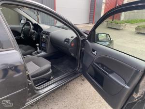 Black Ford Mondeo 2003 in Alytus, with an engine capacity of 2.00 L and mileage of 313 thousand km for 950 €, photo 12 on AUTOMOTO.COM.LV