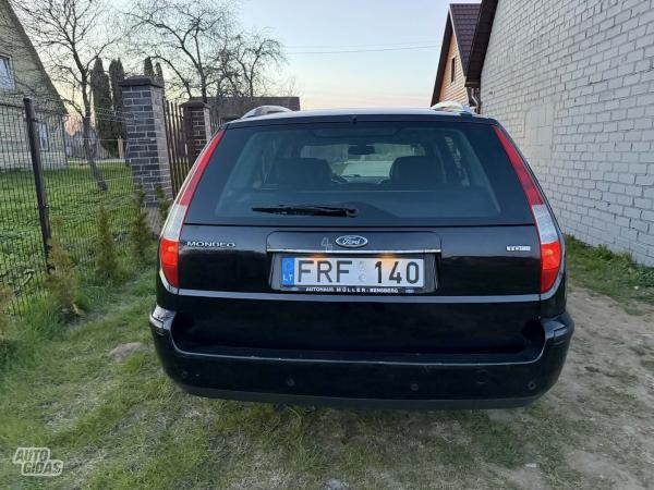 Black Ford Mondeo 2005 in Anyksciai, with an engine capacity of 2.00 L and mileage of 211 thousand km for 1599 €, photo 4 on AUTOMOTO.COM.LV