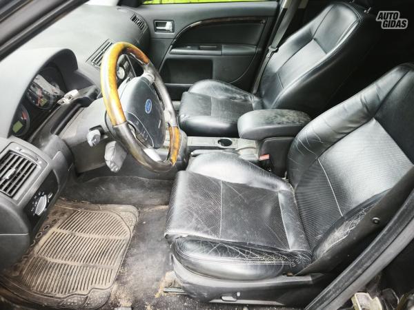 Black Ford Mondeo 2005 in Kaunas, with an engine capacity of 2.00 L and mileage of 250 thousand km for 499 €, photo 5 on AUTOMOTO.COM.LV