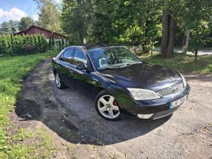 Black Ford Mondeo 2006 in Riga, with an engine capacity of 2.00 L and mileage of 208 thousand km for 1200 €, photo  on AUTOMOTO.COM.LV