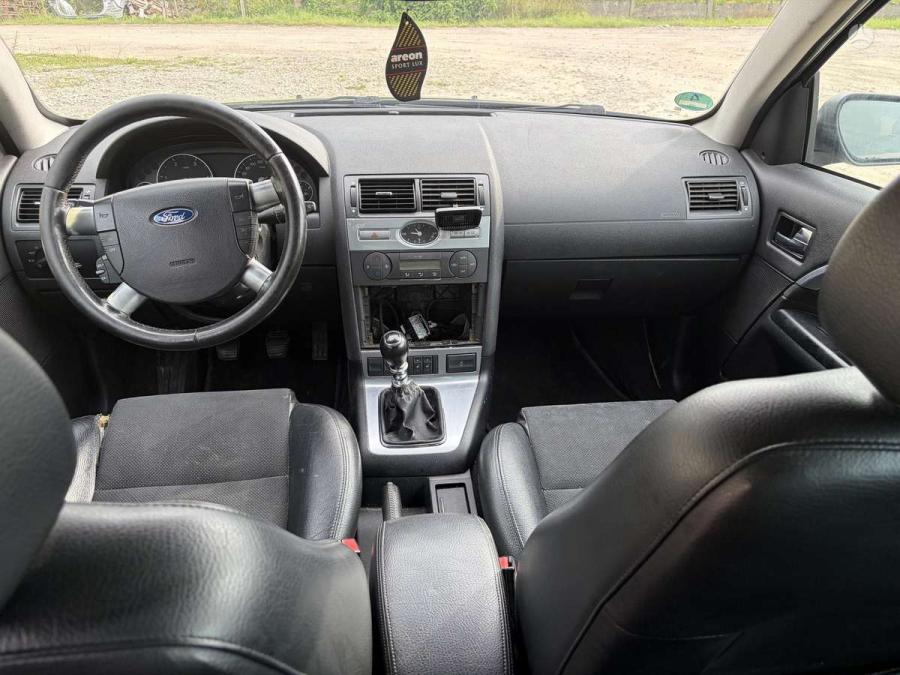 Black Ford Mondeo 2006 in Vilnius, with an engine capacity of 2.00 L and mileage of 402 thousand km for 700 €, photo 9 on AUTOMOTO.COM.LV