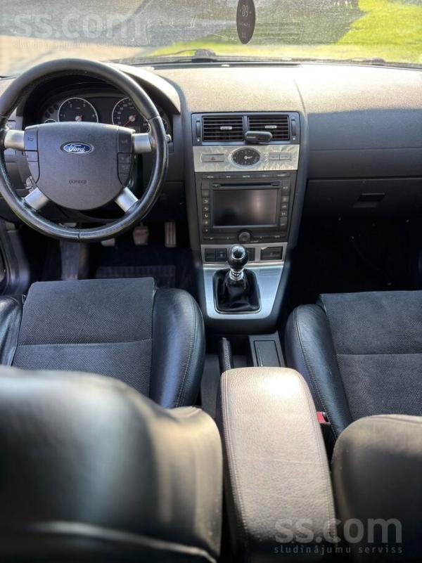 Ford Mondeo 2006 in Kuldiga on AUTOMOTO.COM.LV Black Ford Mondeo 2006 in Kuldiga, with an engine capacity of 2.20 L and mileage of 480 thousand km for 1200 €, photo 4 on AUTOMOTO.COM.LV