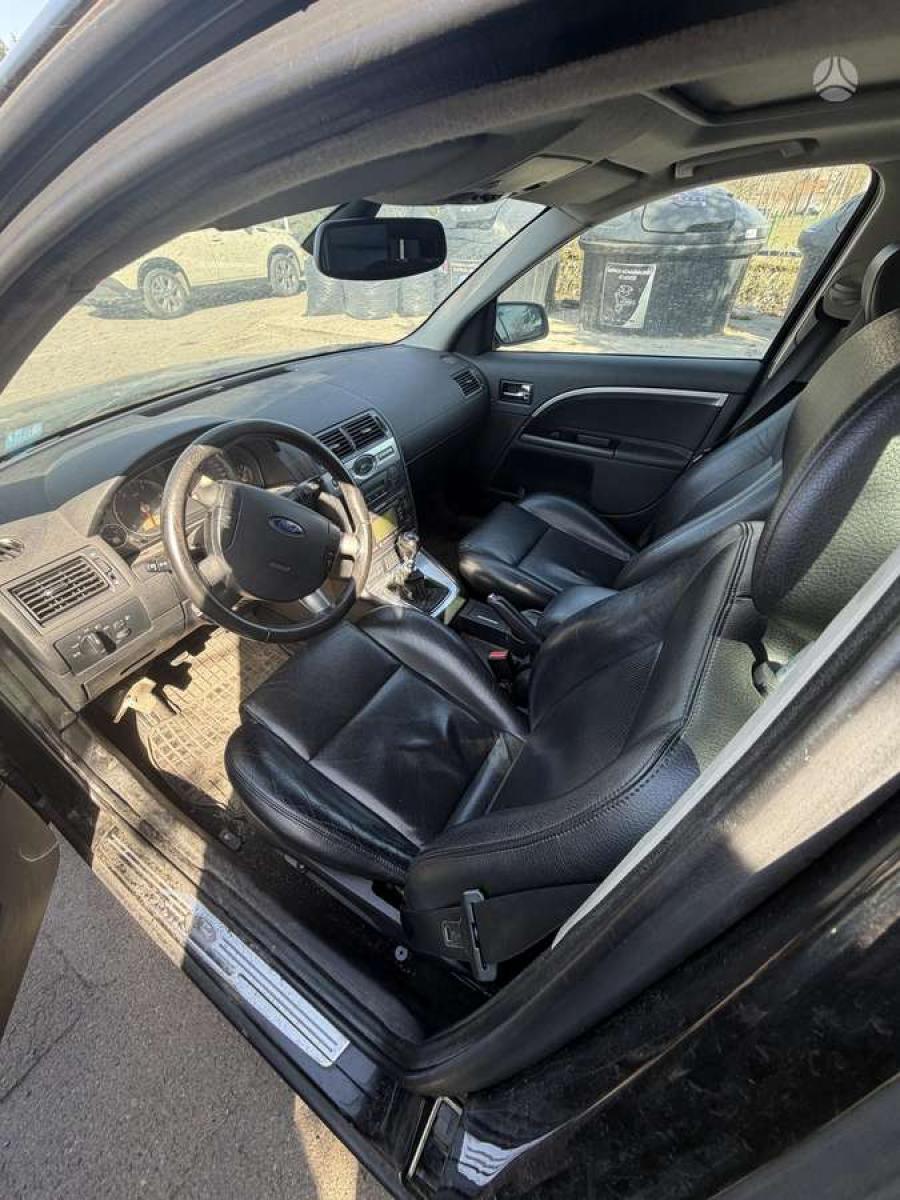 Melns Ford Mondeo 2007 Viļņa, ar dzinēja tilpumu 2.00 L un nobraukumu 400 tūkst. km par 300 €, foto 7 vietnē AUTOMOTO.COM.LV