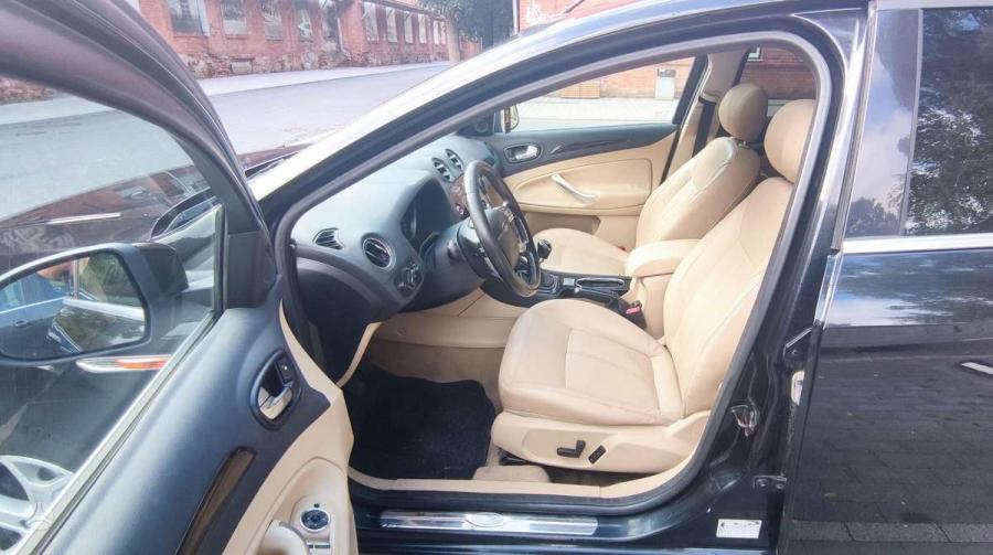 Black Ford Mondeo 2008 in Panevezys, with an engine capacity of 1.75 L and mileage of 290 thousand km for 2400 €, photo 24 on AUTOMOTO.COM.LV