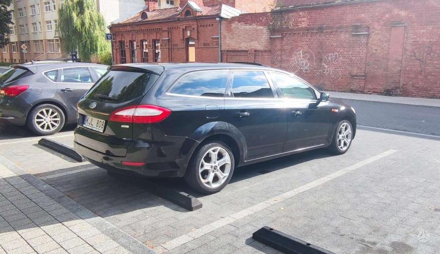 Black Ford Mondeo 2008 in Panevezys, with an engine capacity of 1.75 L and mileage of 290 thousand km for 2400 €, photo 31 on AUTOMOTO.COM.LV