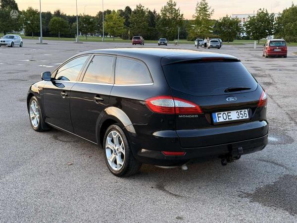 Ford Mondeo 2008 in Kaunas on AUTOMOTO.COM.LV Black Ford Mondeo 2008 in Kaunas, with an engine capacity of 2.00 L and mileage of 406 thousand km for 1900 €, photo 4 on AUTOMOTO.COM.LV