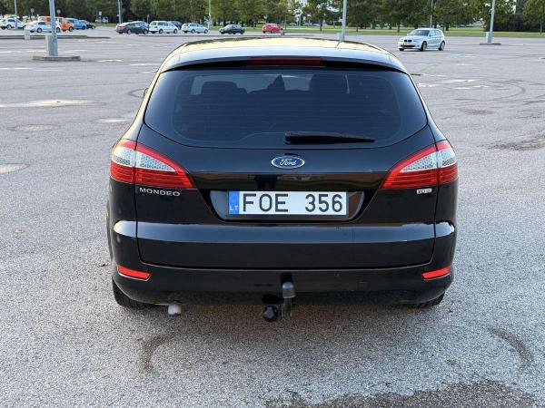 Ford Mondeo 2008 in Kaunas on AUTOMOTO.COM.LV Black Ford Mondeo 2008 in Kaunas, with an engine capacity of 2.00 L and mileage of 406 thousand km for 1900 €, photo 5 on AUTOMOTO.COM.LV