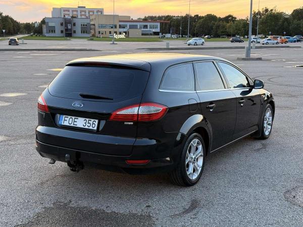 Ford Mondeo 2008 in Kaunas on AUTOMOTO.COM.LV Black Ford Mondeo 2008 in Kaunas, with an engine capacity of 2.00 L and mileage of 406 thousand km for 1900 €, photo 6 on AUTOMOTO.COM.LV