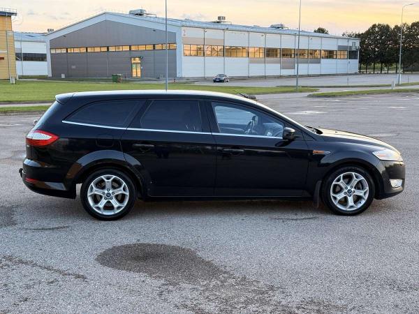 Ford Mondeo 2008 in Kaunas on AUTOMOTO.COM.LV Black Ford Mondeo 2008 in Kaunas, with an engine capacity of 2.00 L and mileage of 406 thousand km for 1900 €, photo 7 on AUTOMOTO.COM.LV
