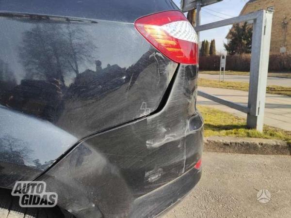 Black Ford Mondeo 2009 in Naujoji Akmene, with an engine capacity of 2.00 L and mileage of 402 thousand km for 800 €, photo 8 on AUTOMOTO.COM.LV