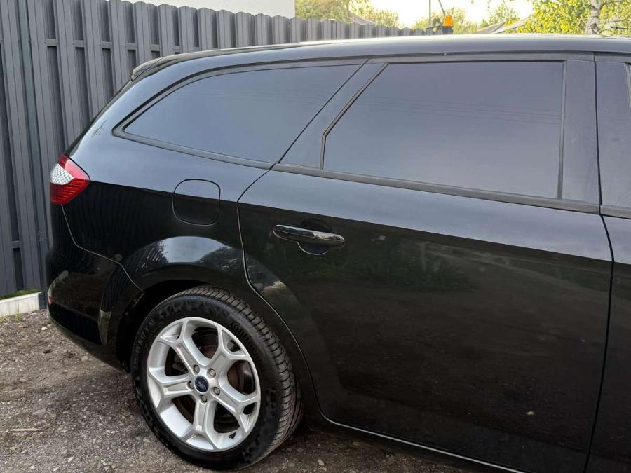 Black Ford Mondeo 2009 in Kaunas, with an engine capacity of 2.00 L and mileage of 260 thousand km for 2100 €, photo 6 on AUTOMOTO.COM.LV