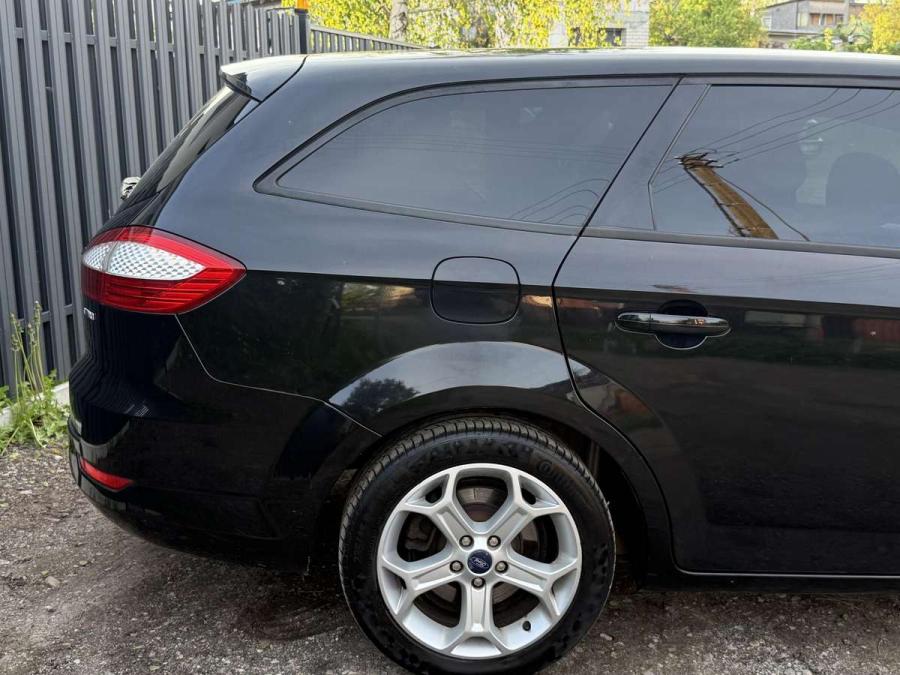 Black Ford Mondeo 2009 in Kaunas, with an engine capacity of 2.00 L and mileage of 260 thousand km for 2100 €, photo 7 on AUTOMOTO.COM.LV