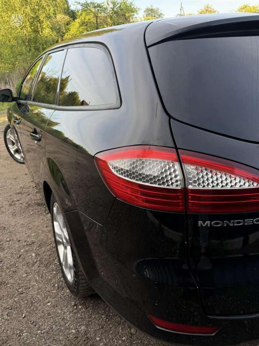 Black Ford Mondeo 2009 in Kaunas, with an engine capacity of 2.00 L and mileage of 260 thousand km for 2100 €, photo 9 on AUTOMOTO.COM.LV