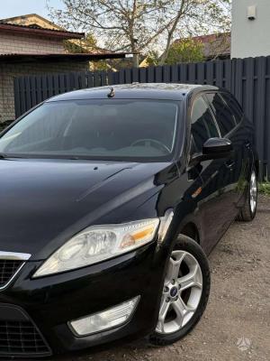 Black Ford Mondeo 2009 in Kaunas, with an engine capacity of 2.00 L and mileage of 260 thousand km for 2100 €, photo 13 on AUTOMOTO.COM.LV