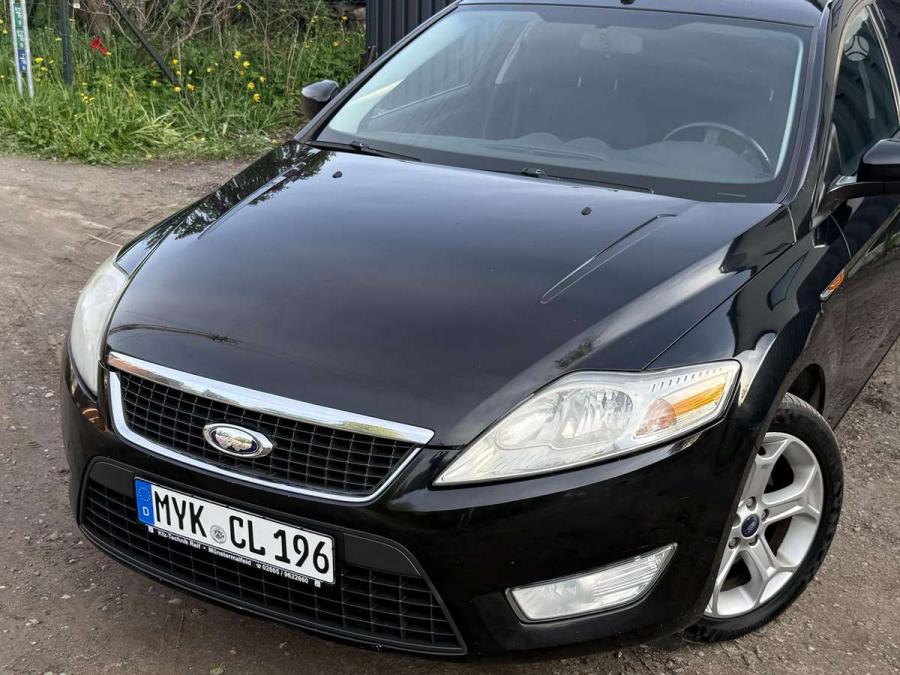 Black Ford Mondeo 2009 in Kaunas, with an engine capacity of 2.00 L and mileage of 260 thousand km for 2100 €, photo 14 on AUTOMOTO.COM.LV