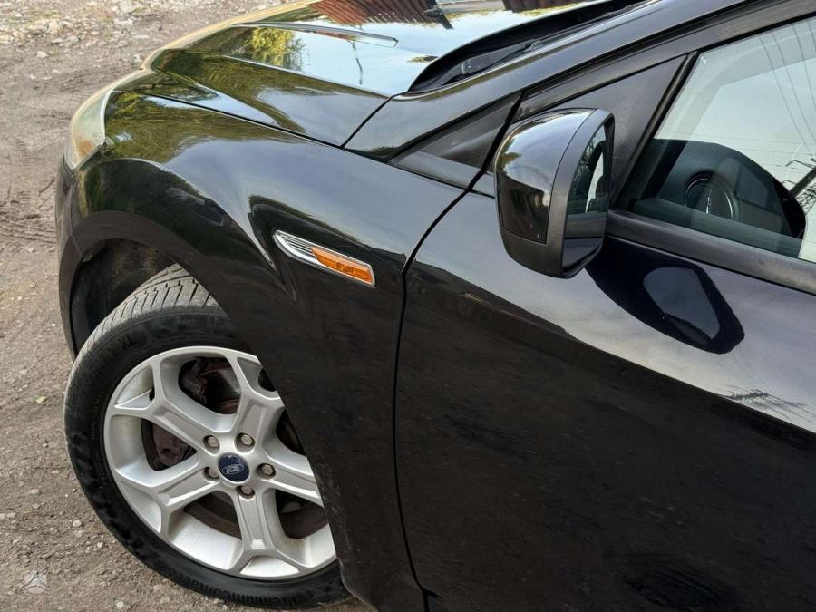 Black Ford Mondeo 2009 in Kaunas, with an engine capacity of 2.00 L and mileage of 260 thousand km for 2100 €, photo 15 on AUTOMOTO.COM.LV