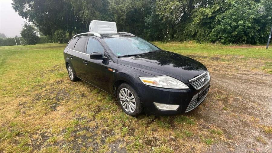 Black Ford Mondeo 2009 in Klaipeda, with an engine capacity of 2.18 L and mileage of 248 thousand km for 2150 €, photo 3 on AUTOMOTO.COM.LV