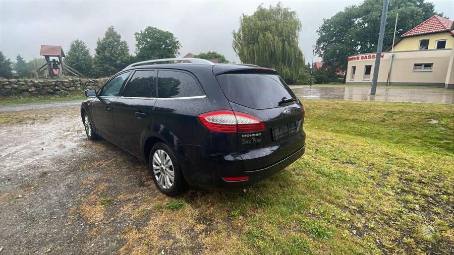 Black Ford Mondeo 2009 in Klaipeda, with an engine capacity of 2.18 L and mileage of 248 thousand km for 2150 €, photo 5 on AUTOMOTO.COM.LV