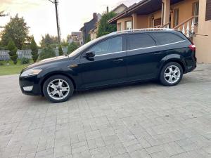 Black Ford Mondeo 2009 in Vilnius, with an engine capacity of 1.75 L and mileage of 290 thousand km for 2000 €, photo 7 on AUTOMOTO.COM.LV