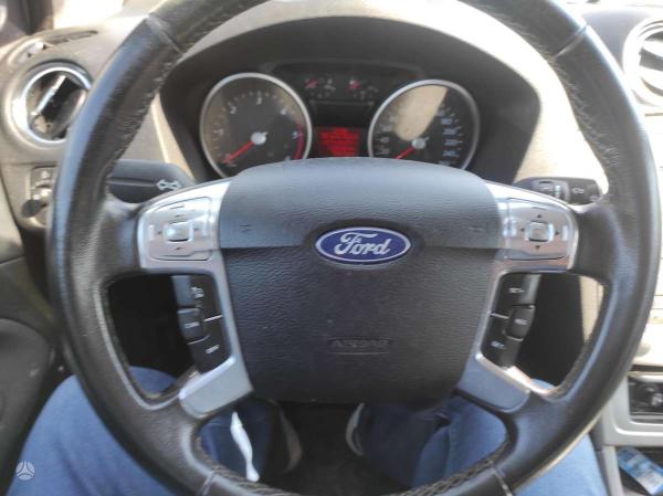 Black Ford Mondeo 2010 in Silute, with an engine capacity of 2.00 L and mileage of 230 thousand km for 750 €, photo 9 on AUTOMOTO.COM.LV