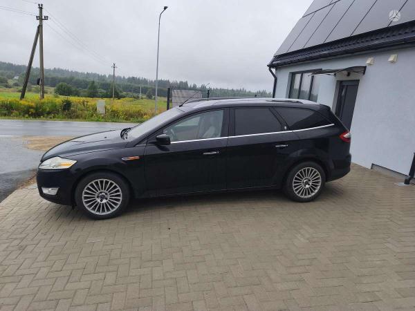Ford Mondeo 2010 in Vilnius on AUTOMOTO.COM.LV Black Ford Mondeo 2010 in Vilnius, with an engine capacity of 1.75 L and mileage of 293 thousand km for 2150 €, photo 5 on AUTOMOTO.COM.LV