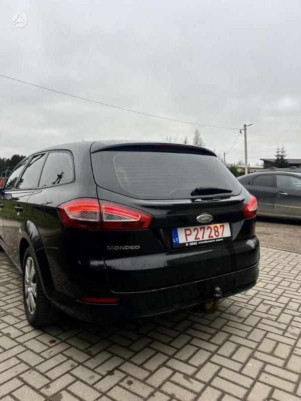 Black Ford Mondeo 2011 in Kaunas, with an engine capacity of 2.00 L and mileage of 266 thousand km for 3250 €, photo 1 on AUTOMOTO.COM.LV