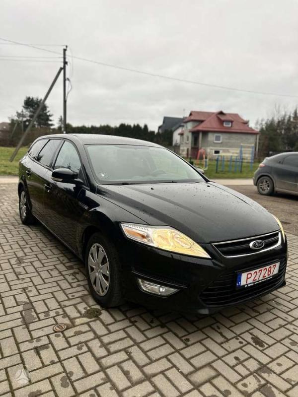 Black Ford Mondeo 2011 in Kaunas, with an engine capacity of 2.00 L and mileage of 266 thousand km for 3250 €, photo 2 on AUTOMOTO.COM.LV