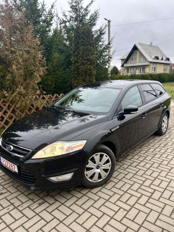 Black Ford Mondeo 2011 in Kaunas, with an engine capacity of 2.00 L and mileage of 266 thousand km for 3250 €, photo 4 on AUTOMOTO.COM.LV
