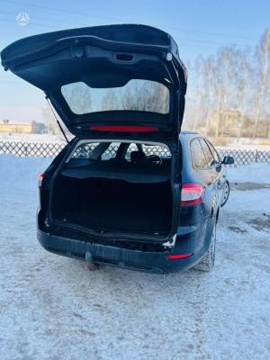 Black Ford Mondeo 2011 in Kaunas, with an engine capacity of 2.00 L and mileage of 266 thousand km for 3100 €, photo 6 on AUTOMOTO.COM.LV