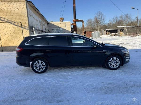 Black Ford Mondeo 2011 in Kaunas, with an engine capacity of 1.56 L and mileage of 279 thousand km for 3100 €, photo 2 on AUTOMOTO.COM.LV