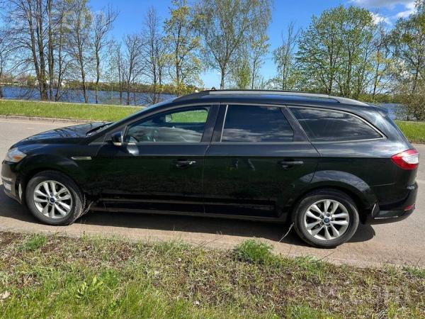 Melns Ford Mondeo 2011 Rīga, ar dzinēja tilpumu 2.00 L un nobraukumu 316 tūkst. km par 3400 €, foto 4 vietnē AUTOMOTO.COM.LV