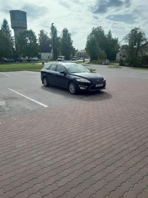Black Ford Mondeo 2011 in Mustvee, with an engine capacity of 2.00 L and mileage of 257 thousand km for 2900 €, photo 9 on AUTOMOTO.COM.LV