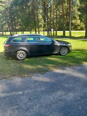 Black Ford Mondeo 2011 in Mustvee, with an engine capacity of 2.00 L and mileage of 257 thousand km for 2900 €, photo 27 on AUTOMOTO.COM.LV