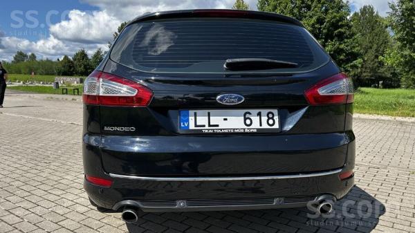 Black Ford Mondeo 2011 in Tukums, with an engine capacity of 2.20 L and mileage of 370 thousand km for 3999 €, photo 6 on AUTOMOTO.COM.LV
