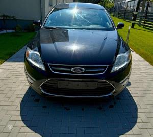 Black Ford Mondeo 2012 in Klaipeda, with an engine capacity of 2.00 L and mileage of 246 thousand km for 2750 €, photo 4 on AUTOMOTO.COM.LV