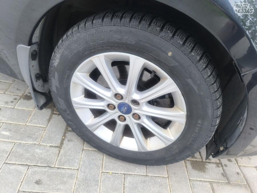 Melns Ford Mondeo 2012 Radviliškis, ar dzinēja tilpumu 2.00 L un nobraukumu 248 tūkst. km par 3950 €, foto 29 vietnē AUTOMOTO.COM.LV
