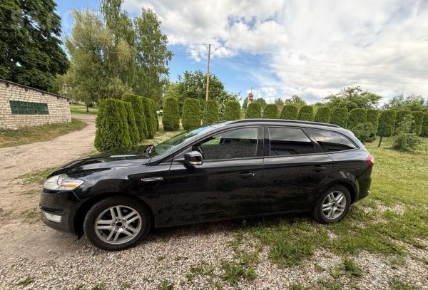 Black Ford Mondeo 2012 in Tukums, with an engine capacity of 2.00 L and mileage of 303 thousand km for 2890 €, photo 7 on AUTOMOTO.COM.LV