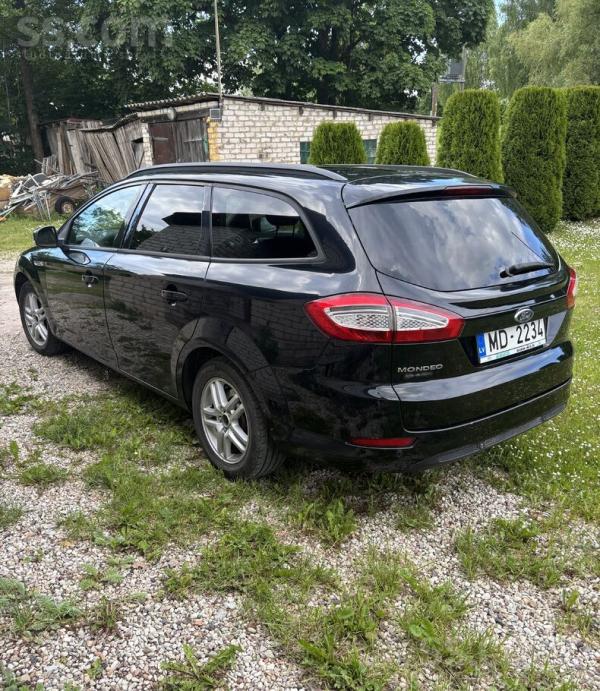 Black Ford Mondeo 2012 in Tukums, with an engine capacity of 2.00 L and mileage of 303 thousand km for 2890 €, photo 8 on AUTOMOTO.COM.LV