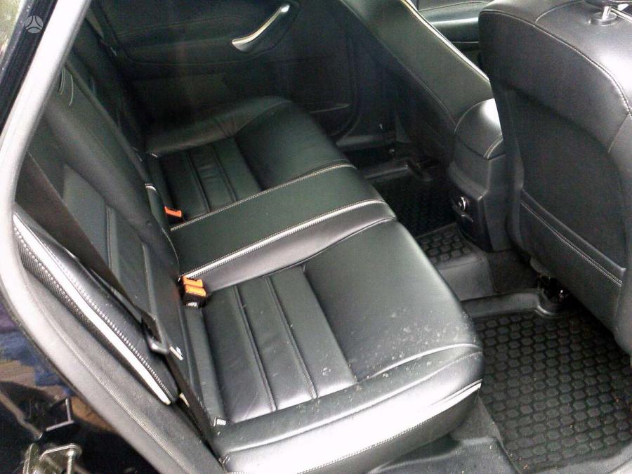 Black Ford Mondeo 2012 in Rokiskis, with an engine capacity of 2.00 L and mileage of 213 thousand km for 1400 €, photo 7 on AUTOMOTO.COM.LV