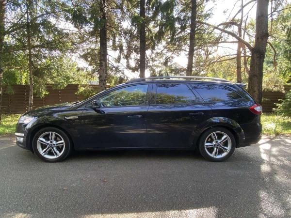 Black Ford Mondeo 2012 in Klaipeda, with an engine capacity of 2.00 L and mileage of 340 thousand km for 3650 €, photo 11 on AUTOMOTO.COM.LV