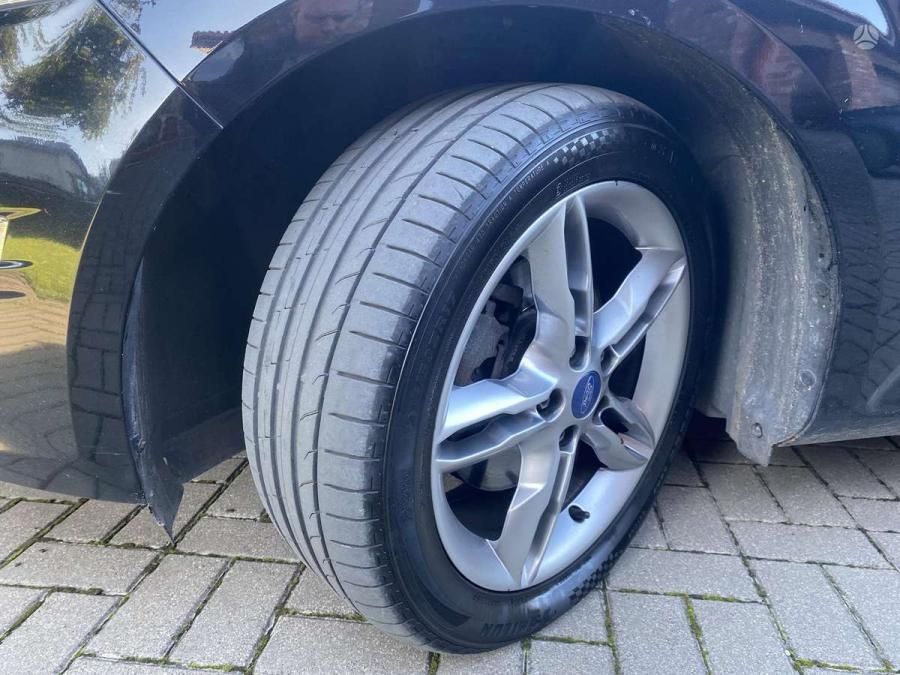 Black Ford Mondeo 2012 in Klaipeda, with an engine capacity of 2.00 L and mileage of 340 thousand km for 3650 €, photo 26 on AUTOMOTO.COM.LV