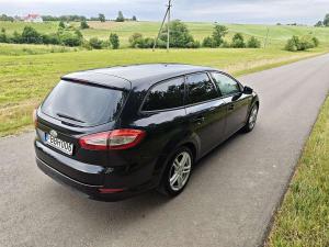Black Ford Mondeo 2013 in Alytus, with an engine capacity of 1.60 L and mileage of 261 thousand km for 3450 €, photo 8 on AUTOMOTO.COM.LV