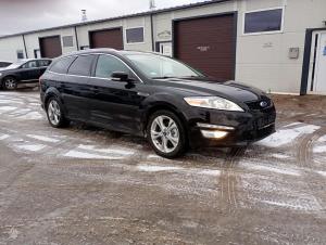 Black Ford Mondeo 2014 in Utena, with an engine capacity of 1.56 L and mileage of 215 thousand km for 4699 €, photo 3 on AUTOMOTO.COM.LV