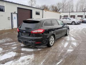 Black Ford Mondeo 2014 in Utena, with an engine capacity of 1.56 L and mileage of 215 thousand km for 4699 €, photo 5 on AUTOMOTO.COM.LV