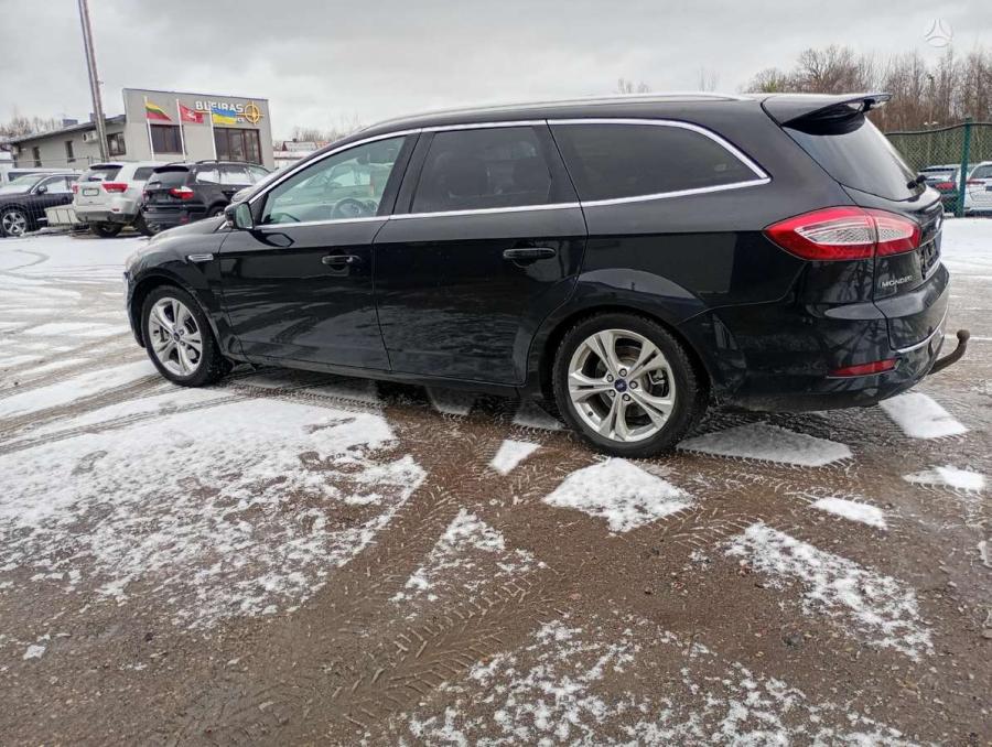 Black Ford Mondeo 2014 in Utena, with an engine capacity of 1.56 L and mileage of 215 thousand km for 4699 €, photo 6 on AUTOMOTO.COM.LV
