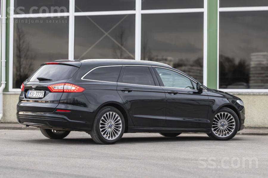 Melns Ford Mondeo 2014 Tukums, ar dzinēja tilpumu 2.00 L un nobraukumu 276 tūkst. km par 6499 €, foto 12 vietnē AUTOMOTO.COM.LV