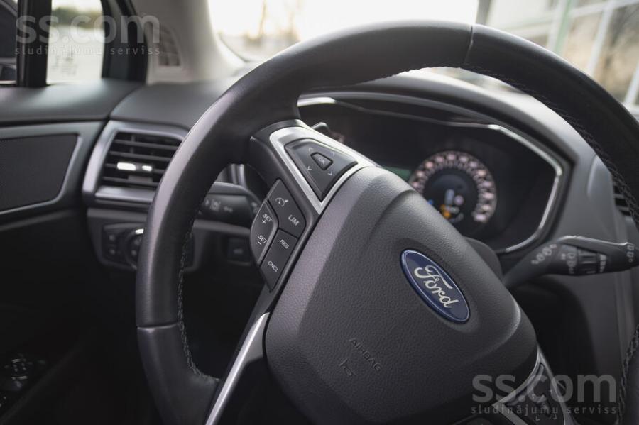 Melns Ford Mondeo 2014 Tukums, ar dzinēja tilpumu 2.00 L un nobraukumu 276 tūkst. km par 6499 €, foto 26 vietnē AUTOMOTO.COM.LV