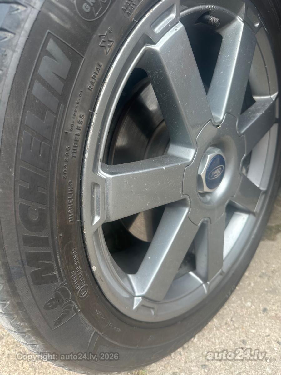 Black Ford Mondeo 2014 in Tartu, with an engine capacity of 2.00 L and mileage of 275 thousand km for 3850 €, photo 19 on AUTOMOTO.COM.LV